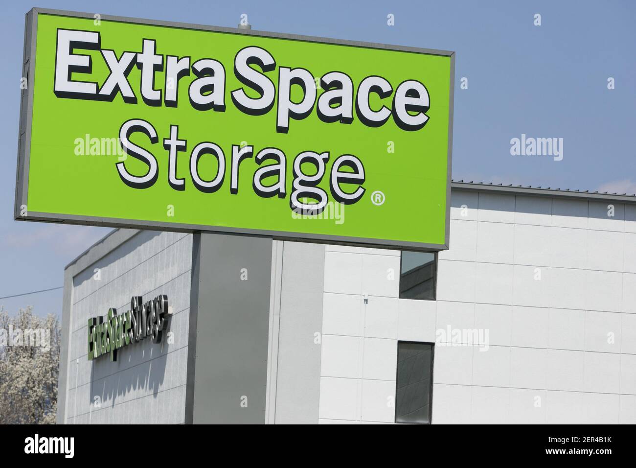 A logo sign outside of a Extra Space Storage location in Wheaton ...