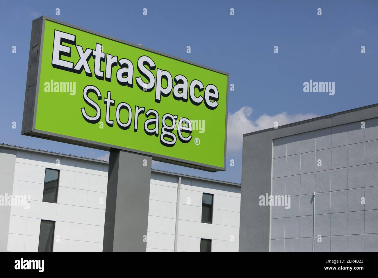 A logo sign outside of a Extra Space Storage location in Wheaton ...