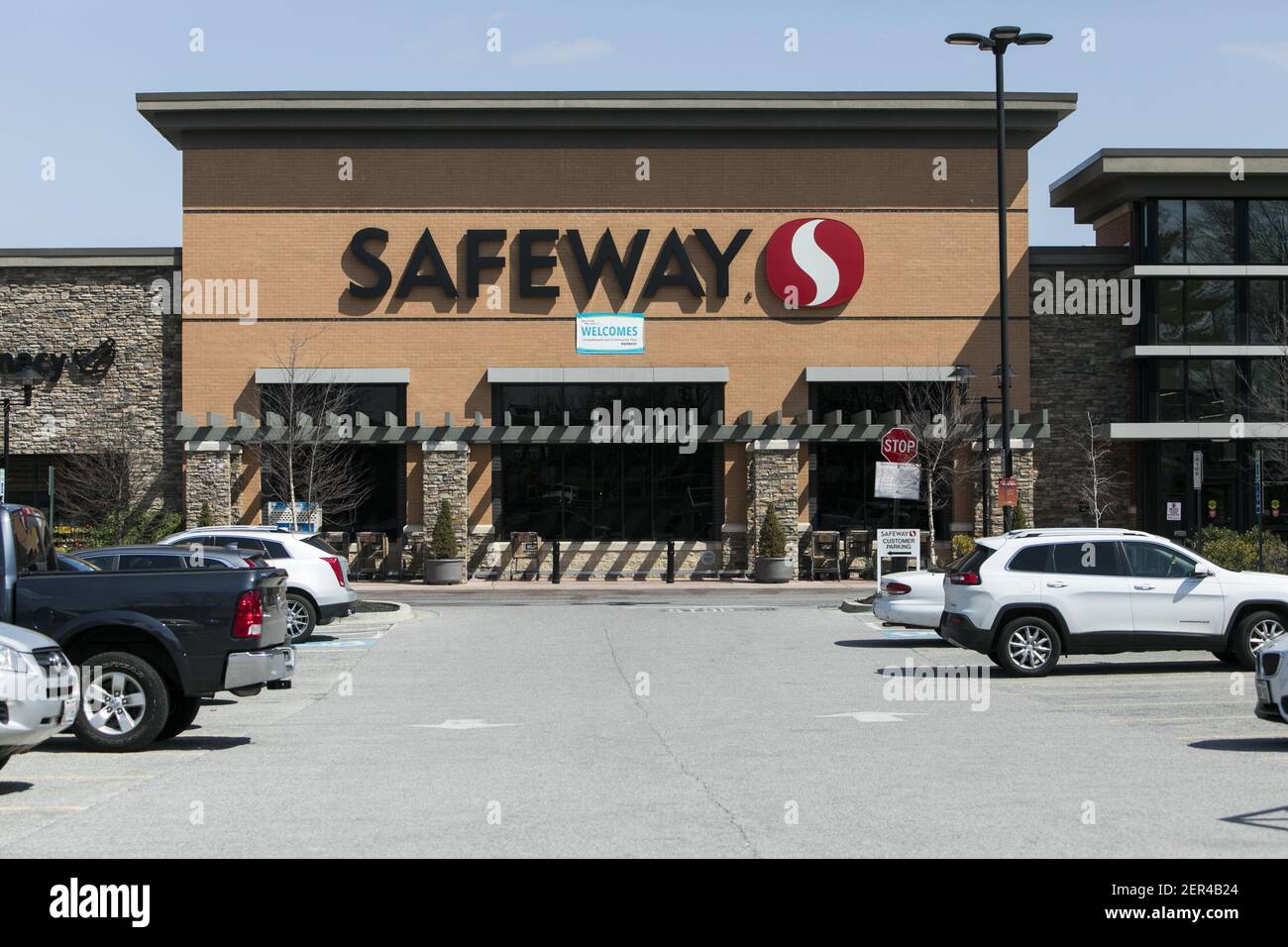 A logo sign outside of a Safeway grocery retail store location in Olney ...