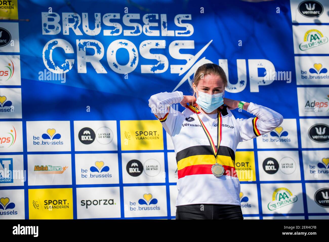 Belgian Lotte Scheldeman celebrates on the podium after winning the ...