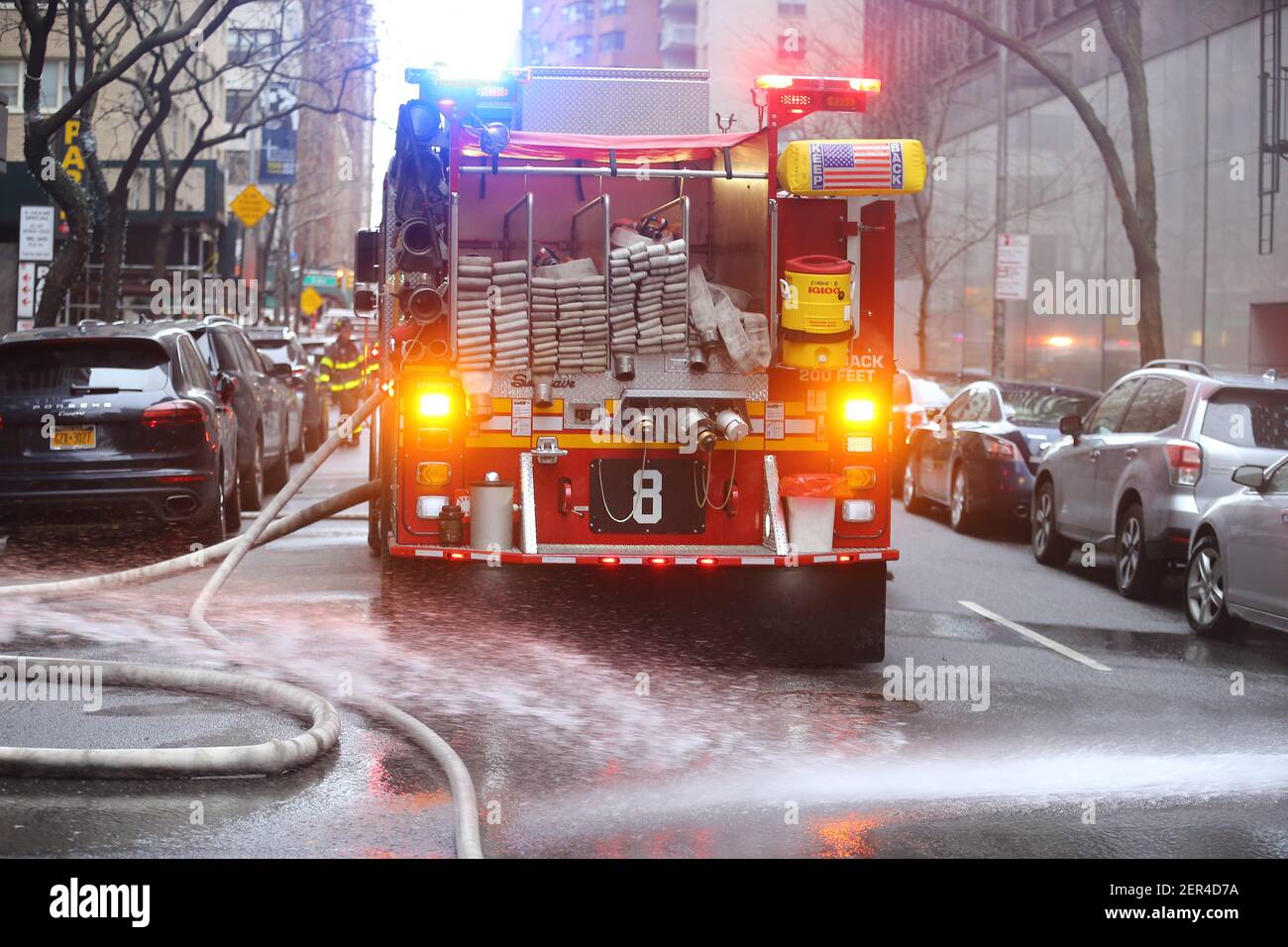 First responders gather at a manhole explosion in midtown Manhattan in ...