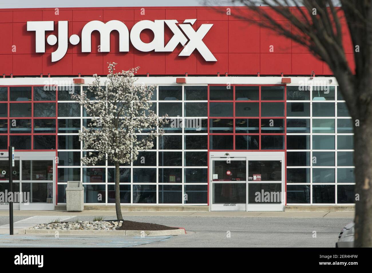 A logo sign outside of a TJ Maxx retail store in Columbia, Maryland on ...