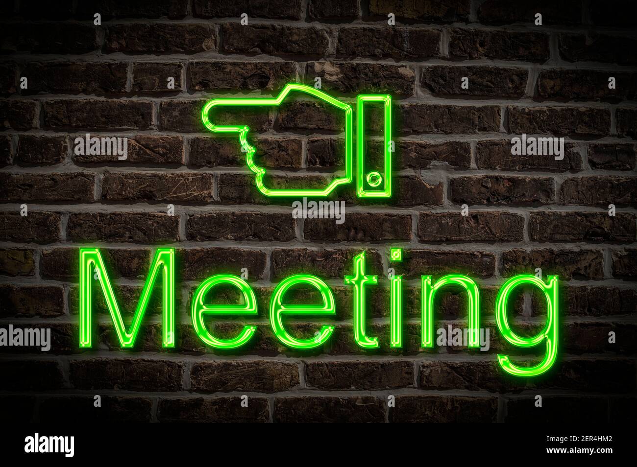 Detail photo of a neon sign on a wall with the inscription Meeting ...