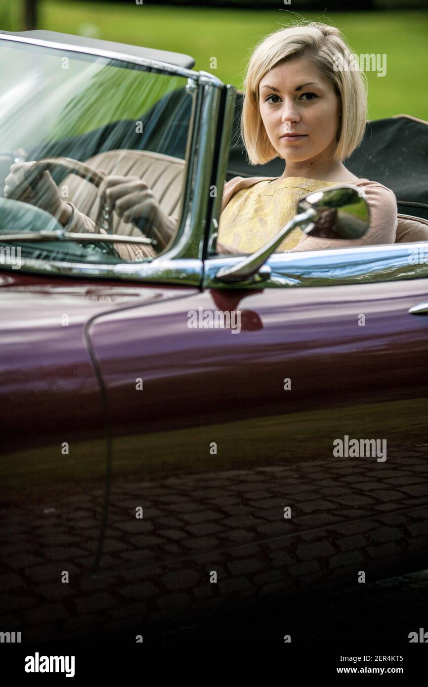 Young woman driving car uk hi-res stock photography and images - Alamy
