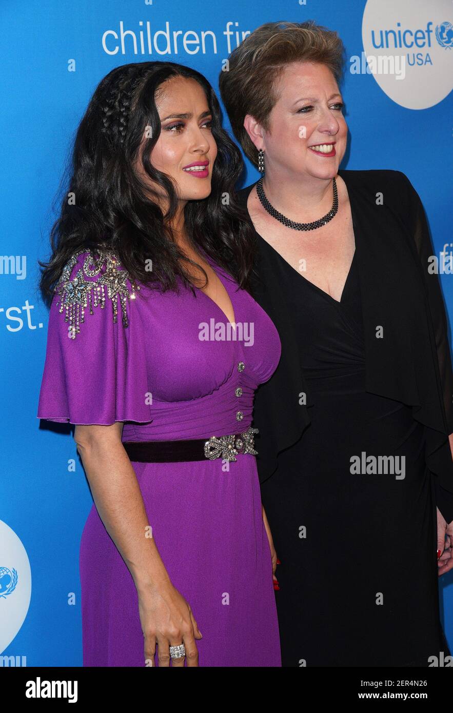 Salma Hayek Pinault (L) and UNICEF USA CEO & President Caryl M. Stern ...