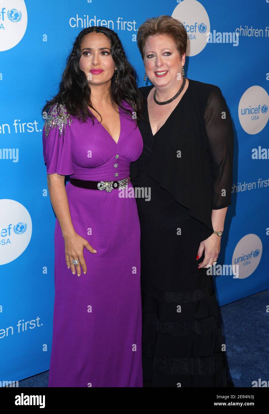 Salma Hayek Pinault (L) and UNICEF USA CEO & President Caryl M. Stern ...
