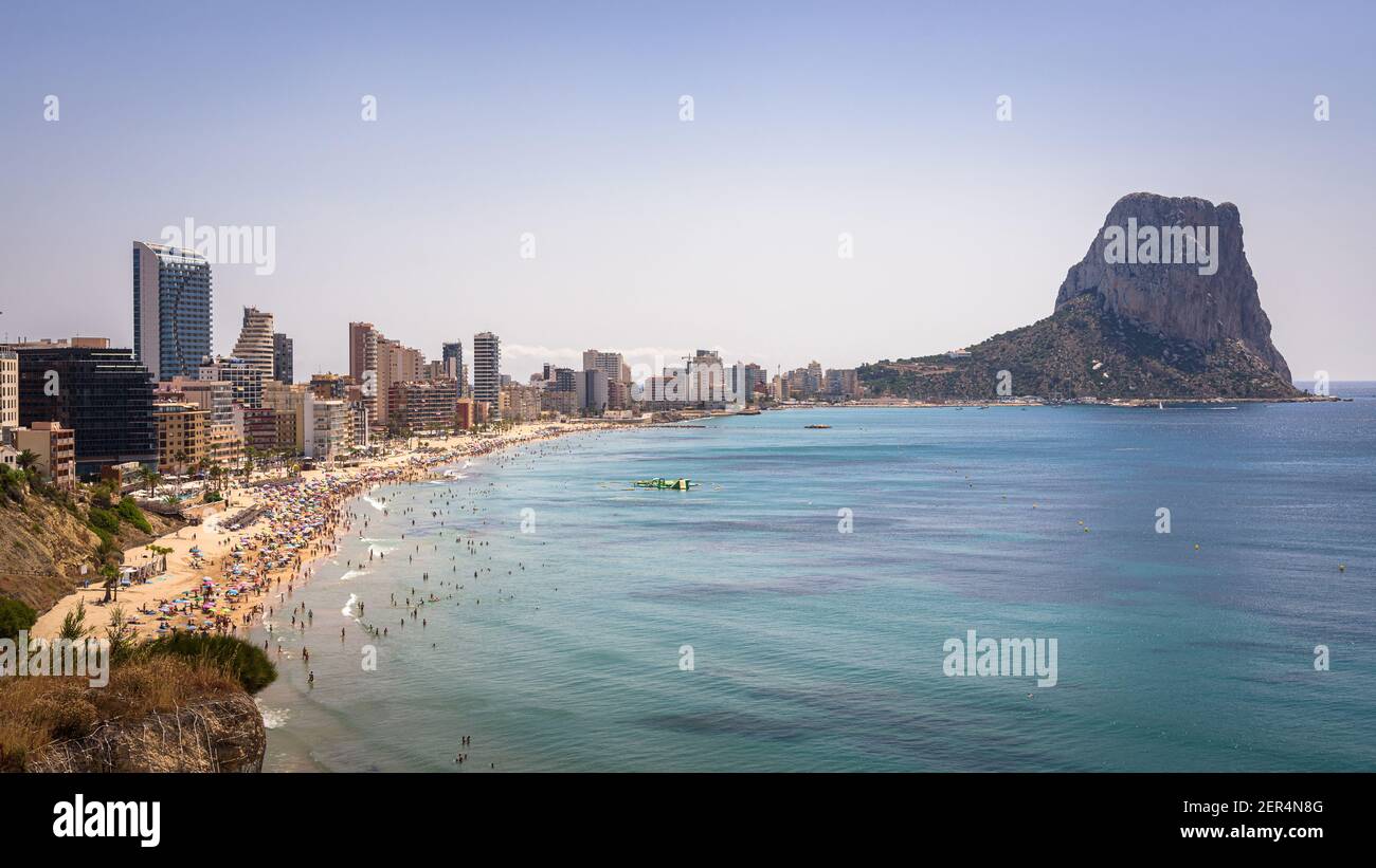 Panoramic view of a crowded beach in Calpe in summer, Spain Stock Photo ...