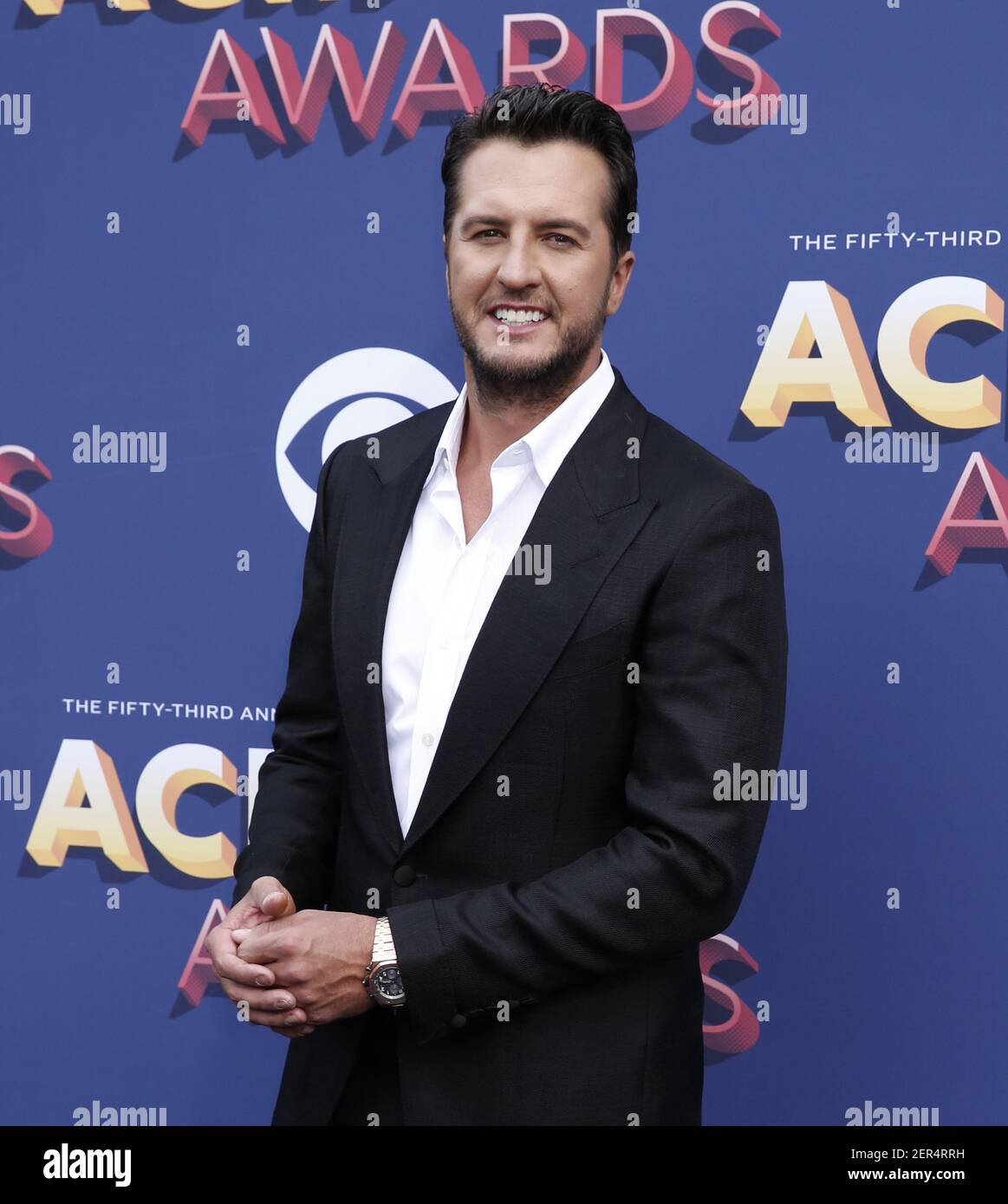 Luke Bryan poses on the red carpet as she arrives for the 53rd Academy ...