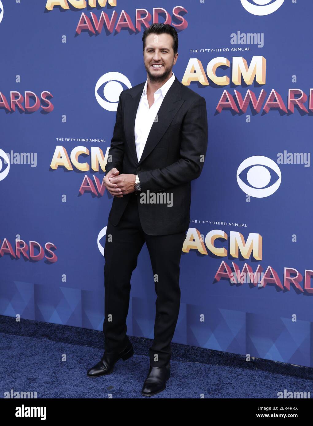 Luke Bryan poses on the red carpet as she arrives for the 53rd Academy ...