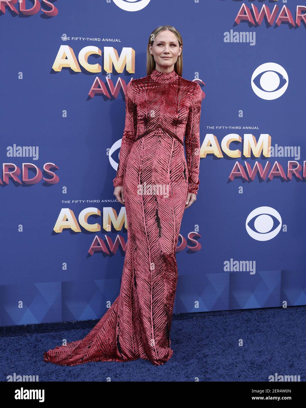 Kristen Hall of Sugarland poses on the red carpet as she arrives for ...