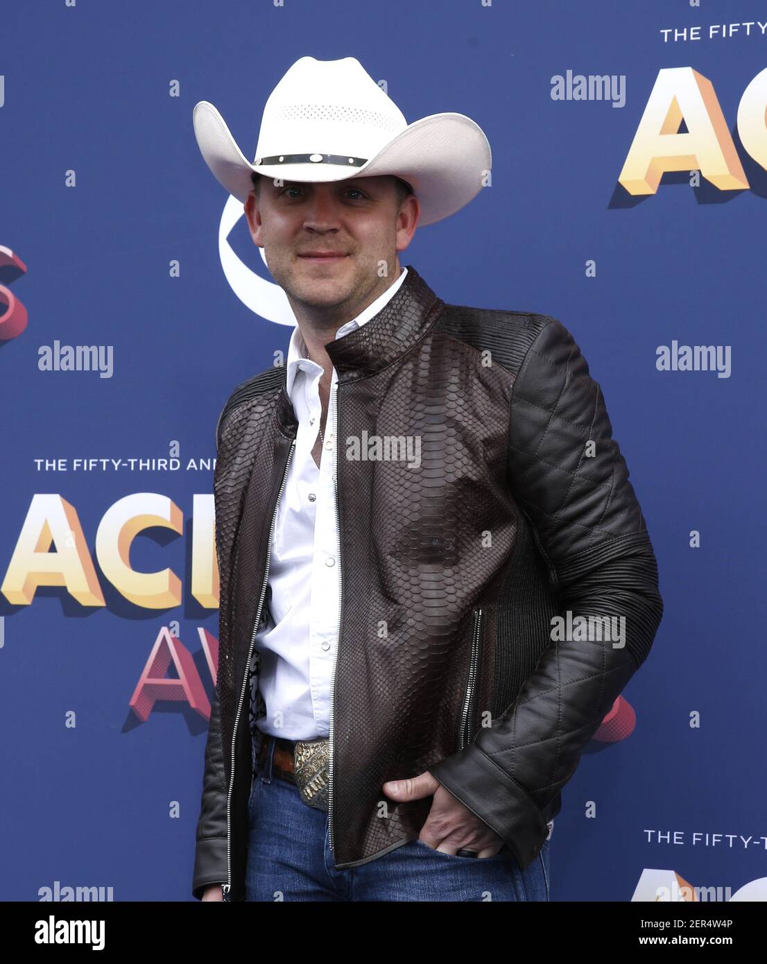 Justin Moore poses on the red carpet as he arrives for the 53rd Academy ...