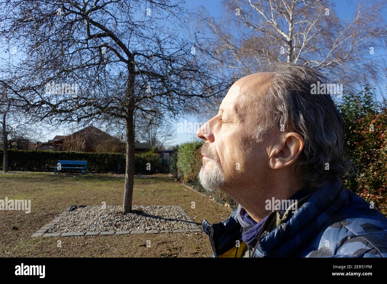 Sun in the spring, elder man Stock Photo - Alamy