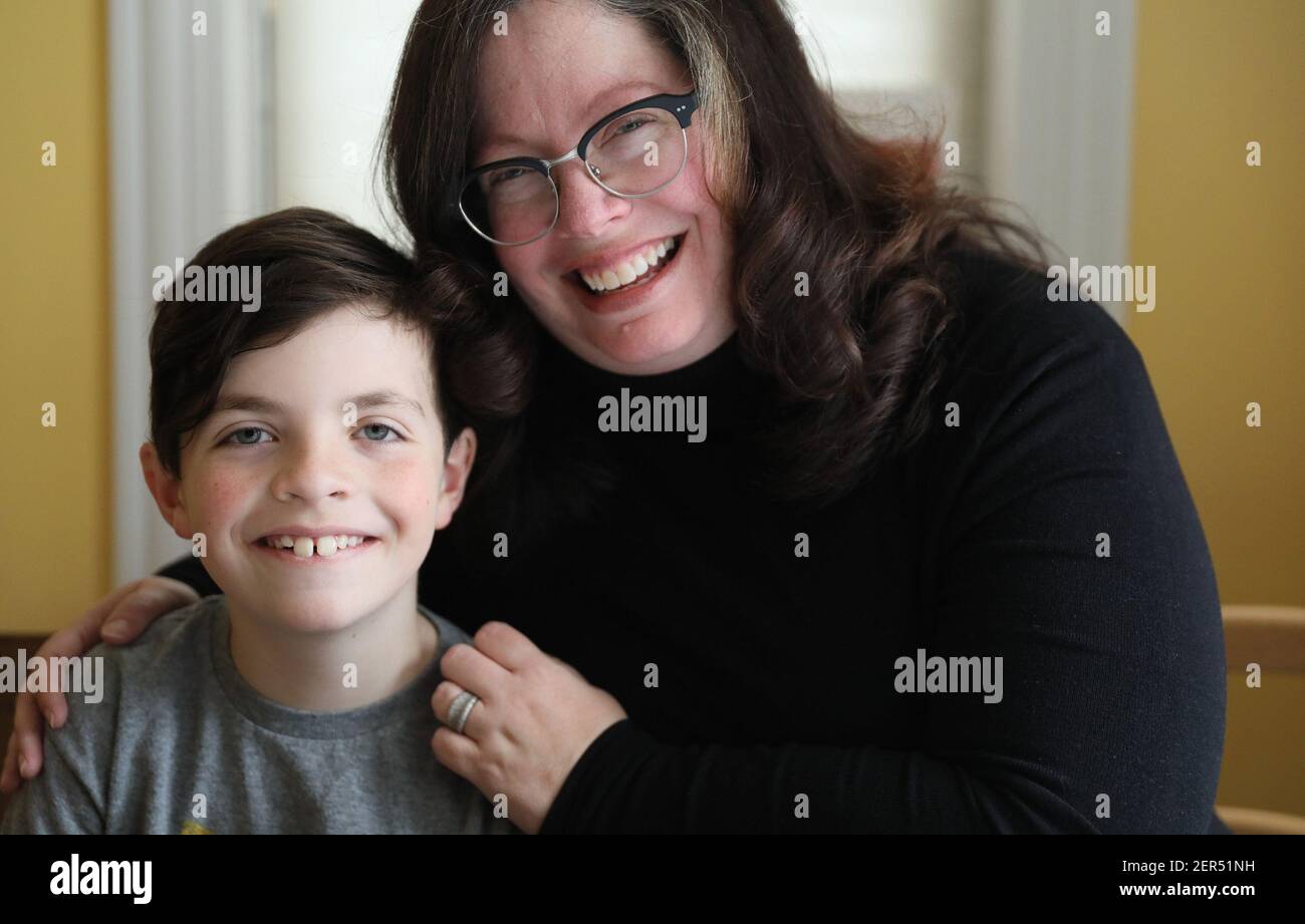 Jay Quirke Hornik, left, 9, poses with his mother Sheila Quirke on ...