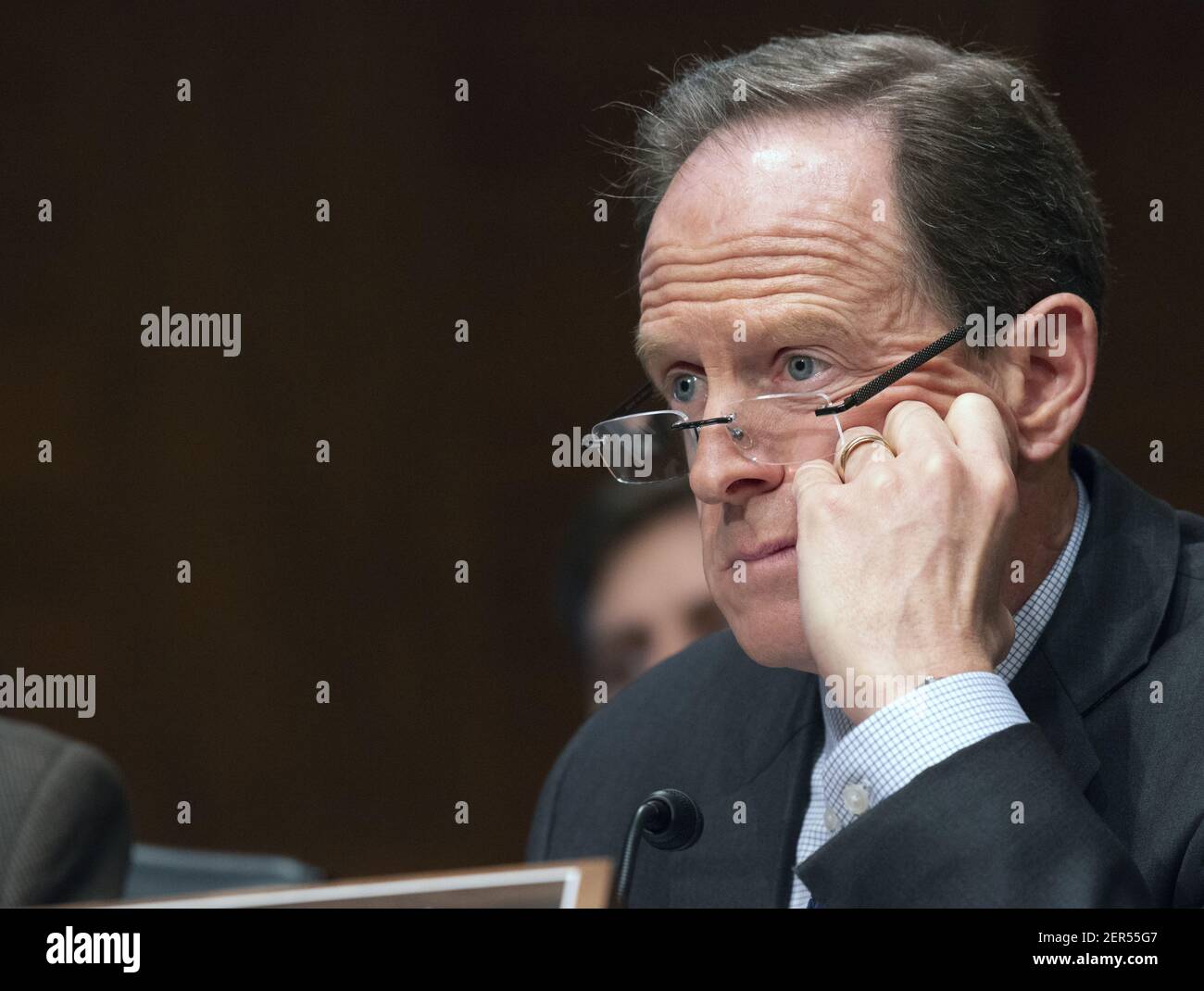 United States Senator Pat Toomey (Republican of Pennsylvania) listens ...
