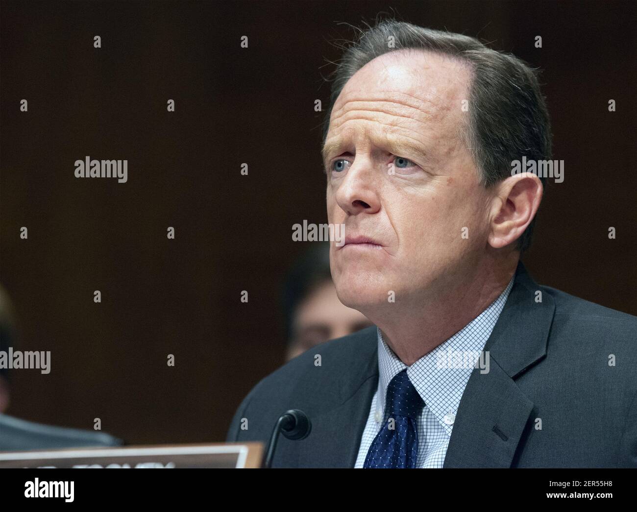 United States Senator Pat Toomey (Republican of Pennsylvania) listens ...