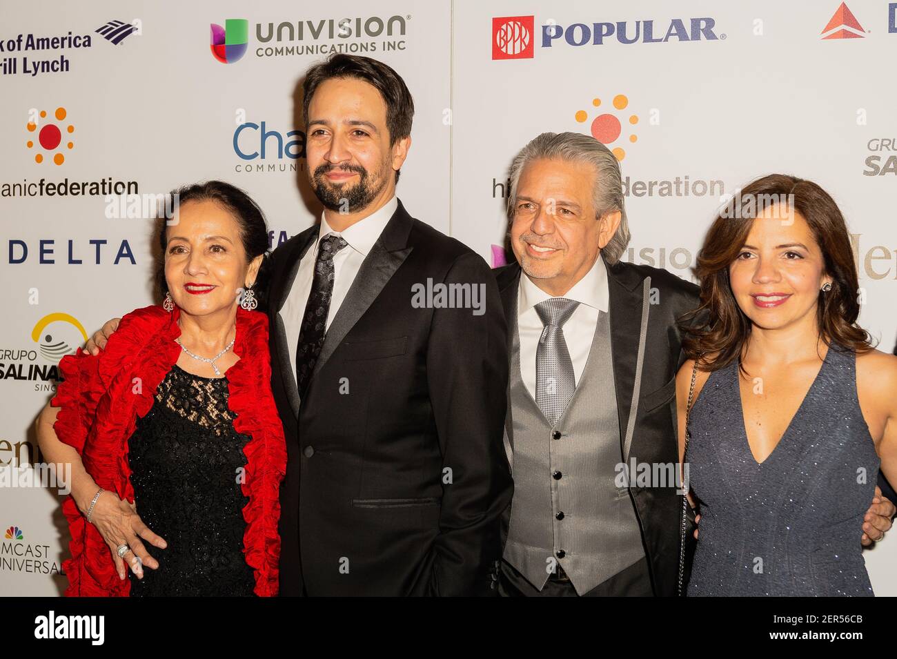 Lin-Manuel Miranda (Center Left) is seen with family members at red ...