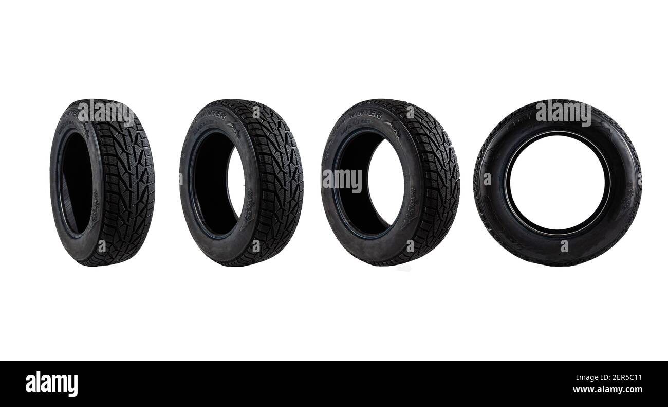 Four tires on the white background Stock Photo - Alamy