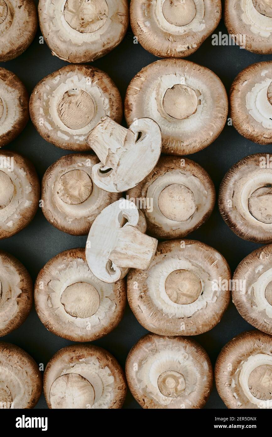 Fresh champignon mushrooms, top view, background Stock Photo - Alamy