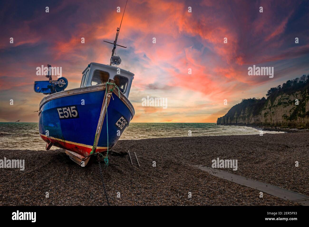 A fishing boat on the beach at Beer, Devon, England. Uk Stock Photo - Alamy