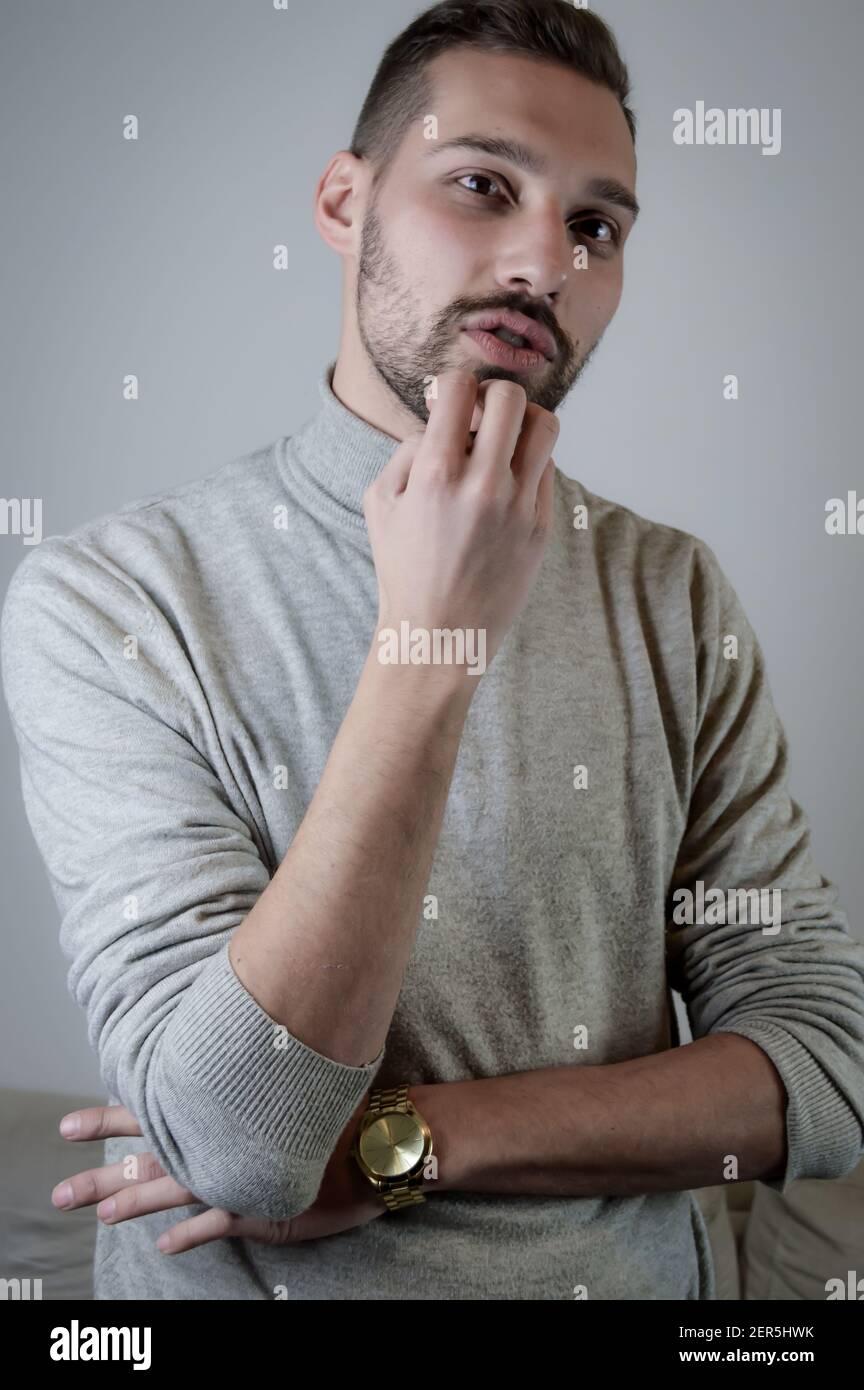 Man touching chin hi-res stock photography and images - Alamy