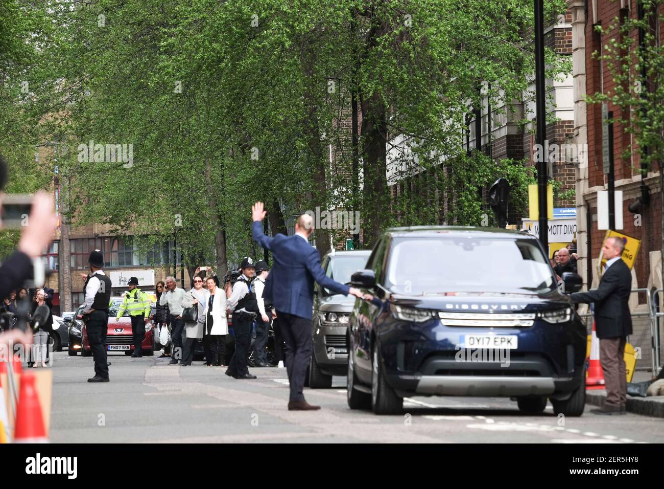 Prince William, Duke of Cambridge waves to well wishers as he departs ...