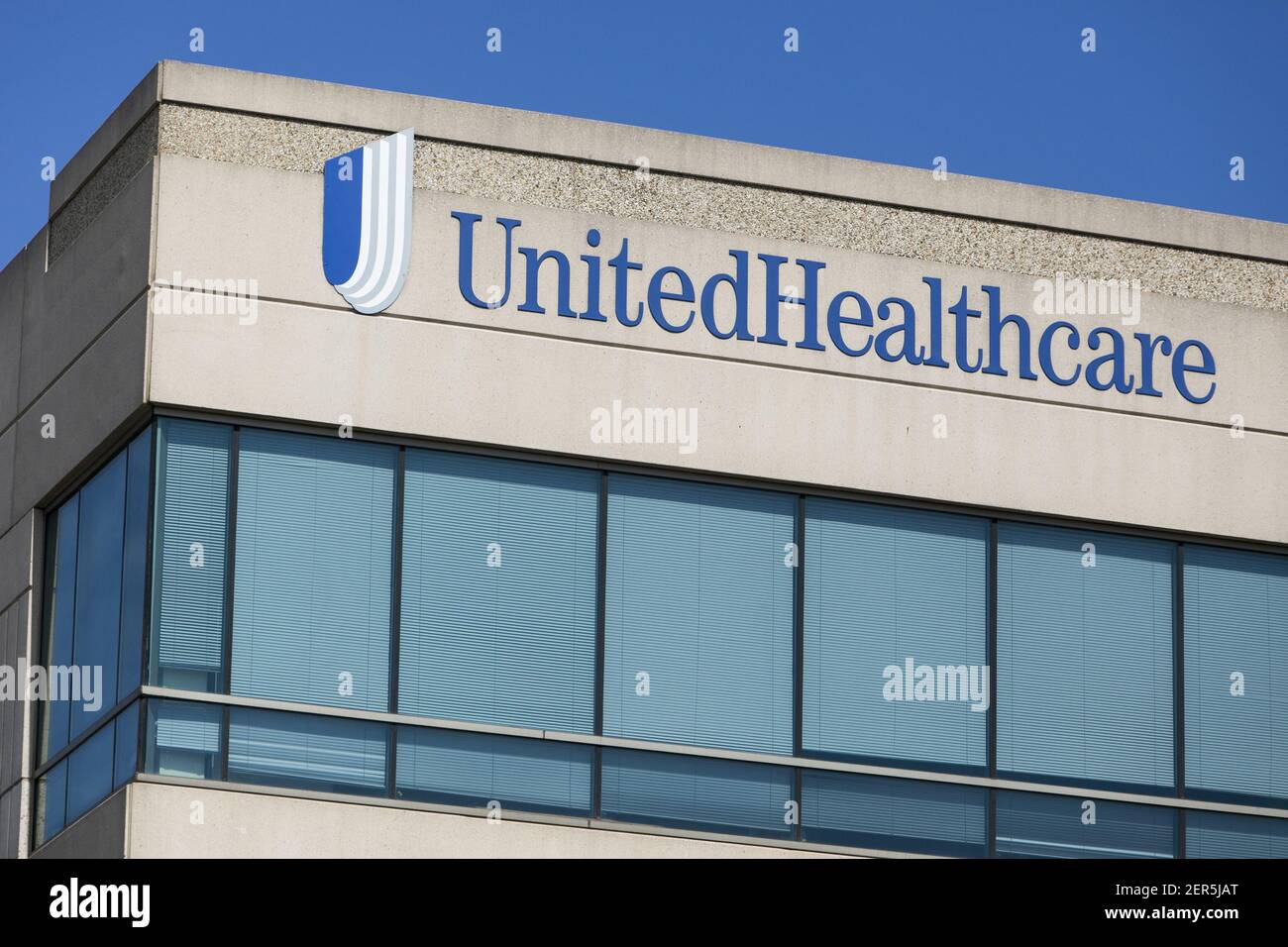 A logo sign outside of a facility occupied by UnitedHealthcare in ...