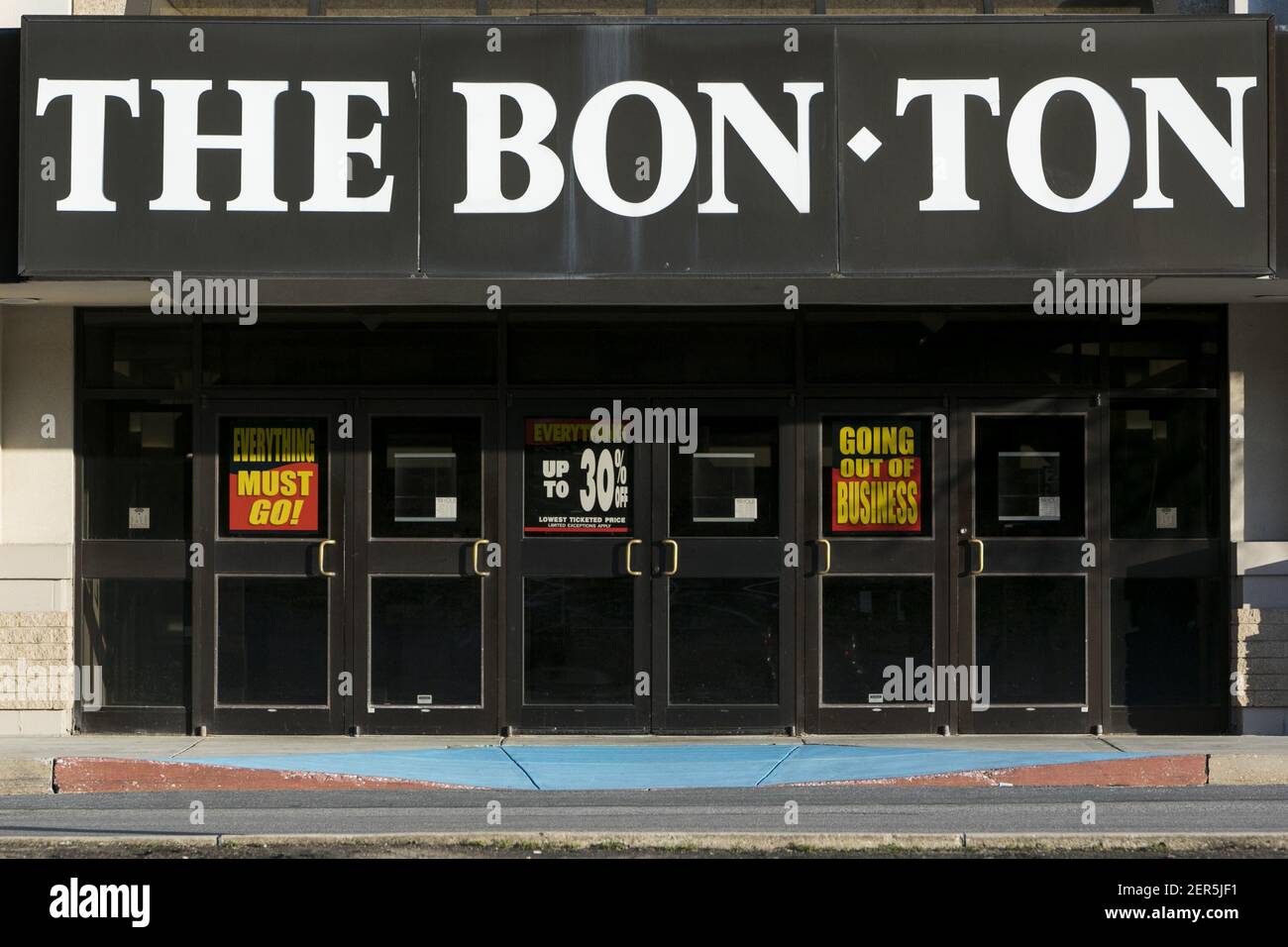 A logo sign outside of a Bon-Ton retail department store in York ...
