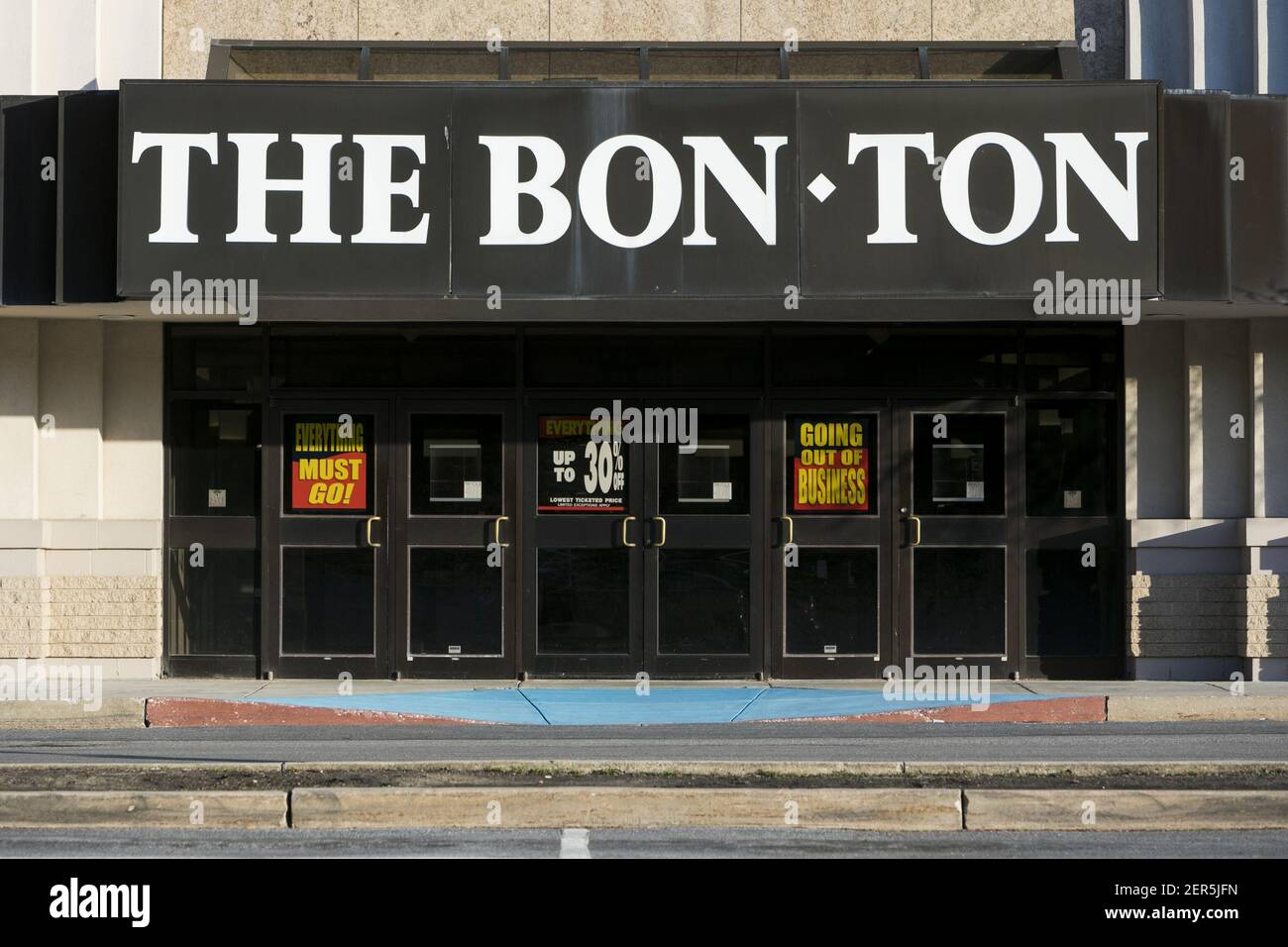 A logo sign outside of a Bon-Ton retail department store in York ...