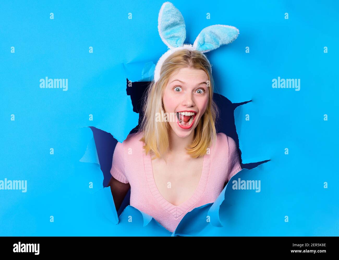 Easter day celebration. Funny girl with bunny ears. Happy woman with ...