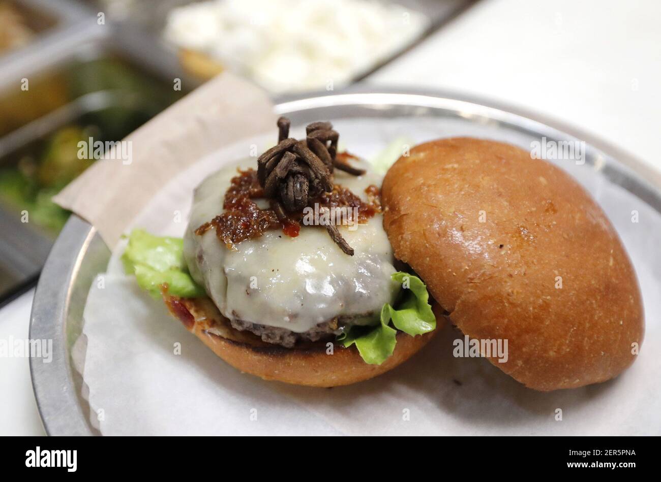 A zebra tarantula is added to the Tarantula Burger at Bull City Burger ...