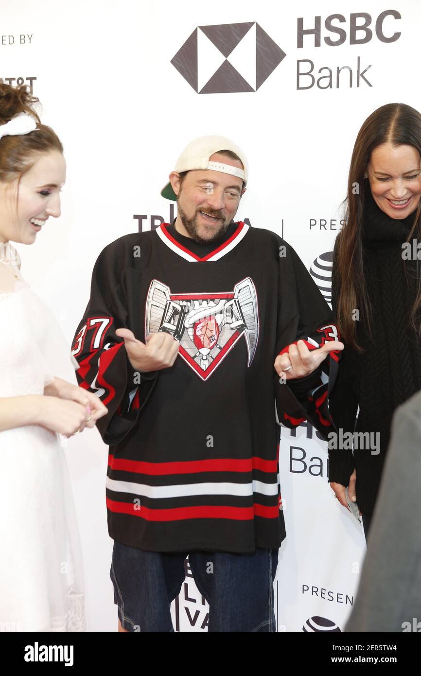 Filmmaker Kevin Smith, wife Jennifer Schwalbach Smith and actress ...