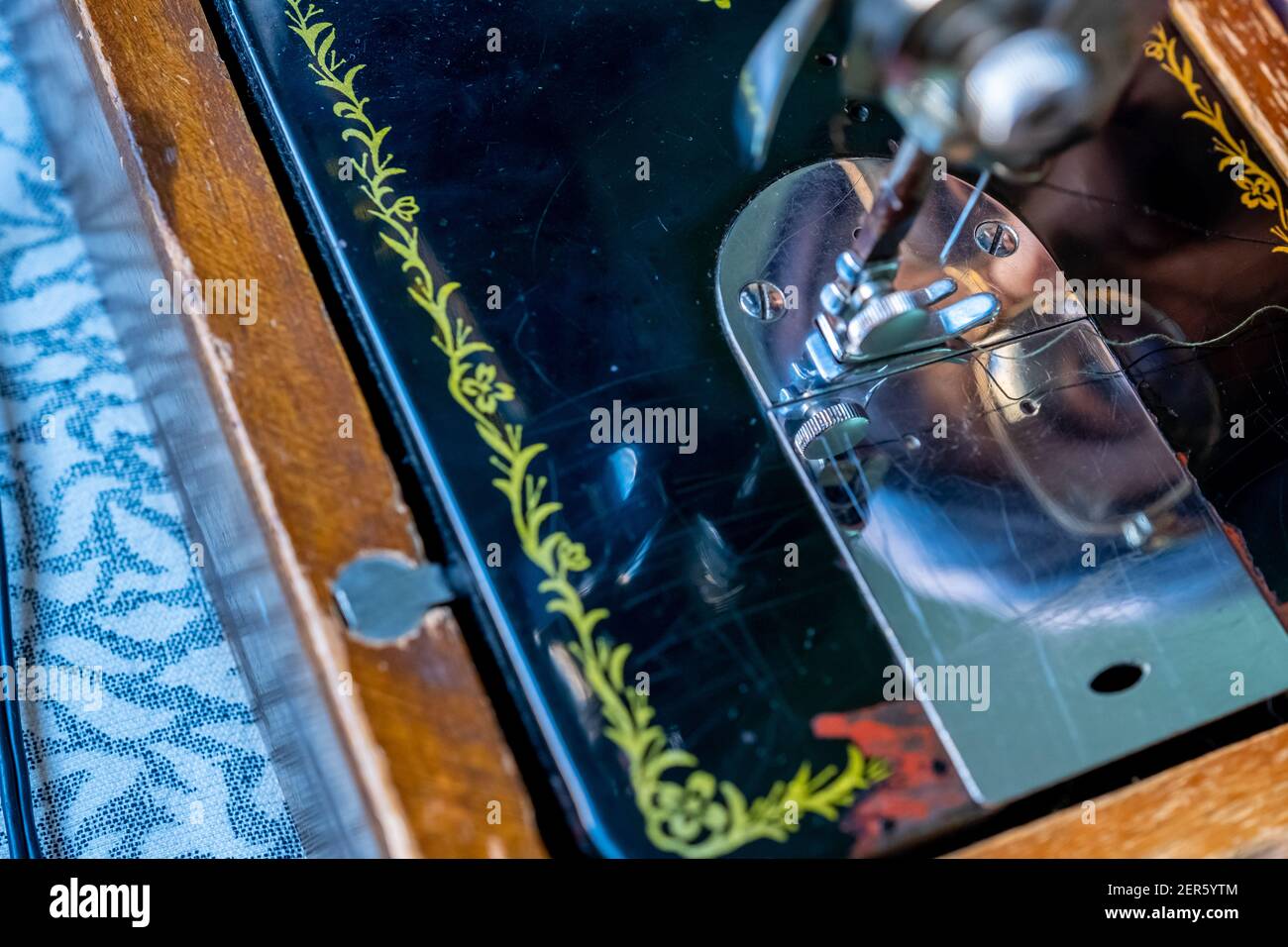 Arabic muslim old woman face reflection in sewing machine Stock Photo ...