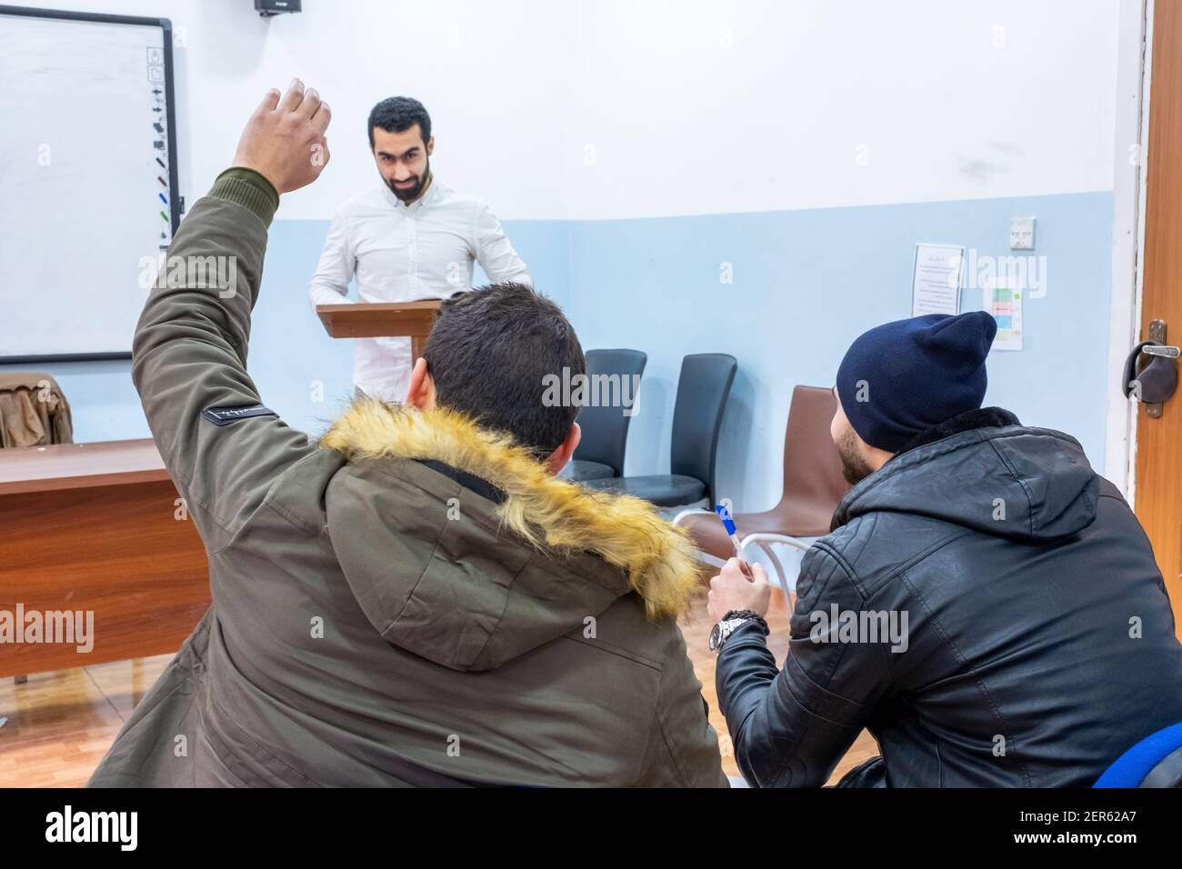 Doctor at university explaining stuff to students Stock Photo - Alamy