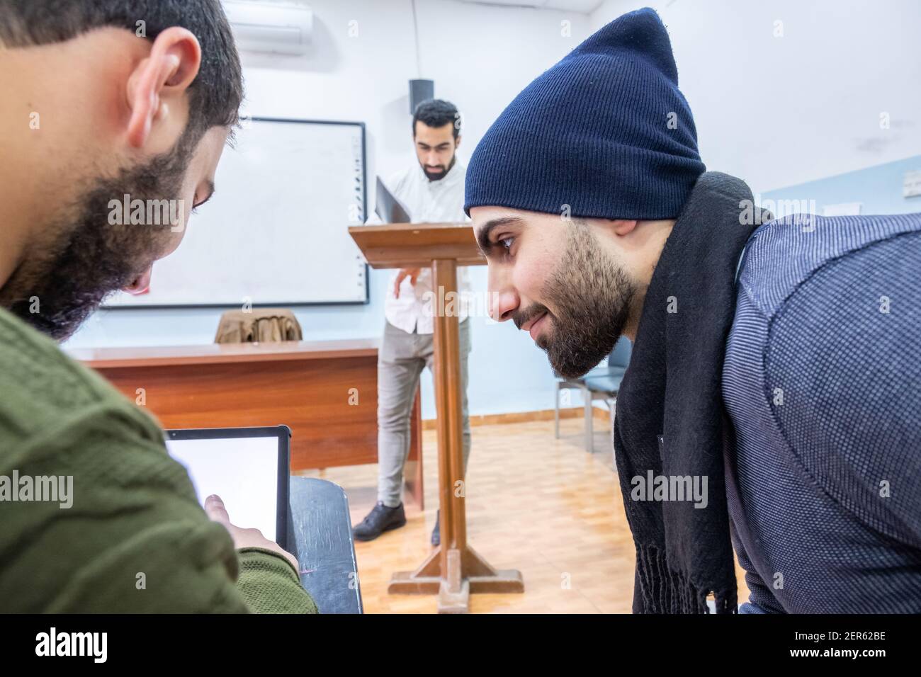 Male arab students in class hi-res stock photography and images - Alamy