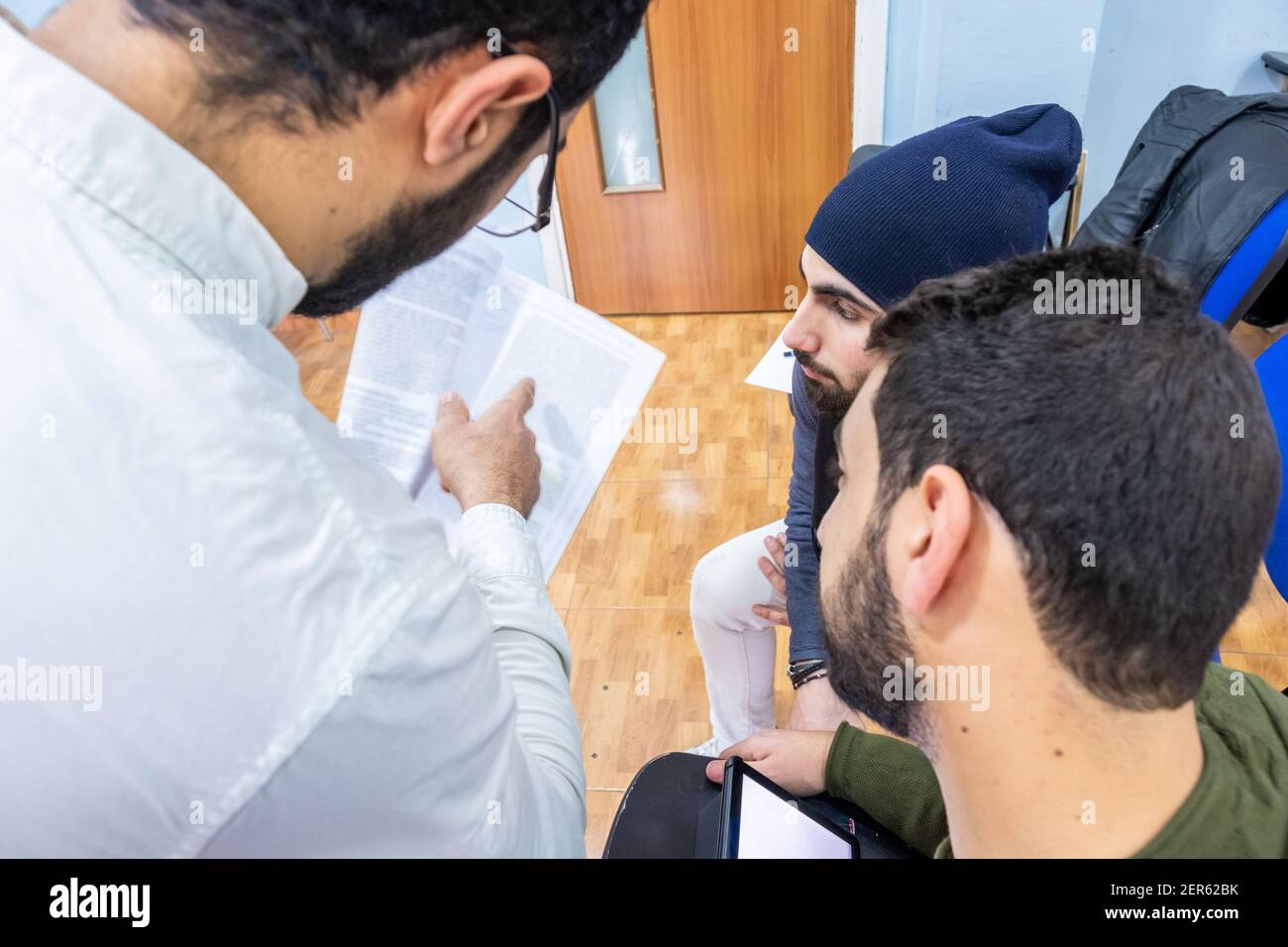 Male arab college students in class hi-res stock photography and images ...
