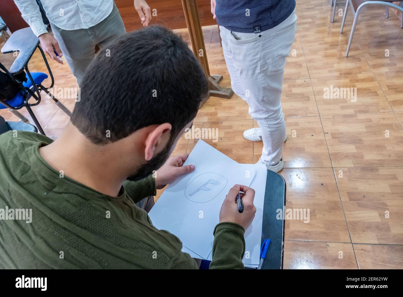 Arabic student getting his exam results Stock Photo - Alamy