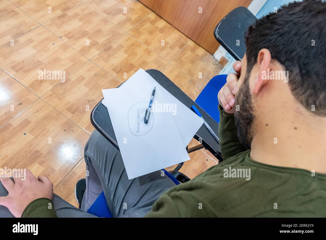 Arabic student getting his exam results Stock Photo - Alamy