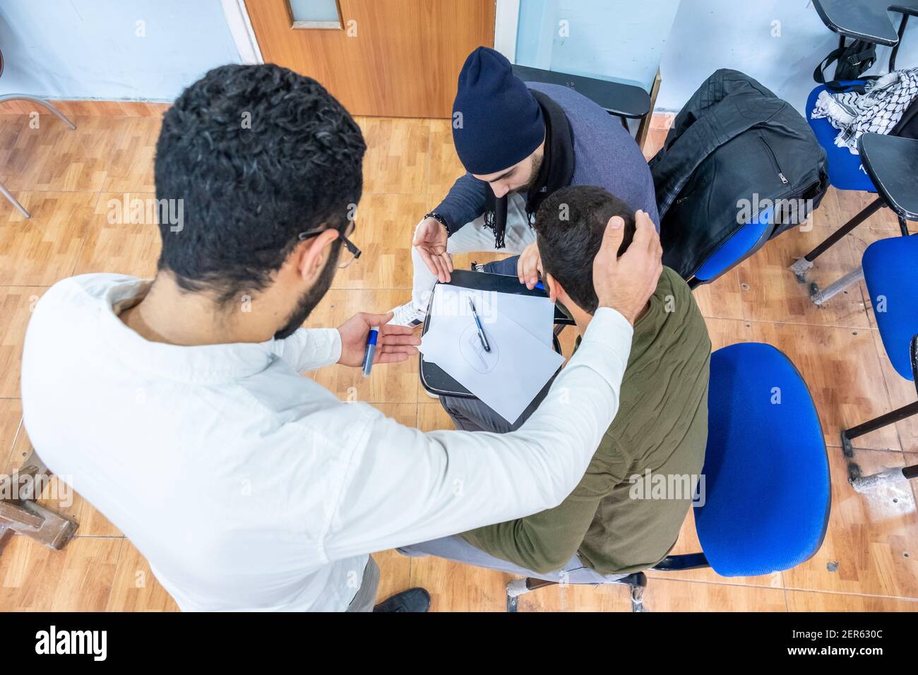 Male arab college students in class hi-res stock photography and images ...