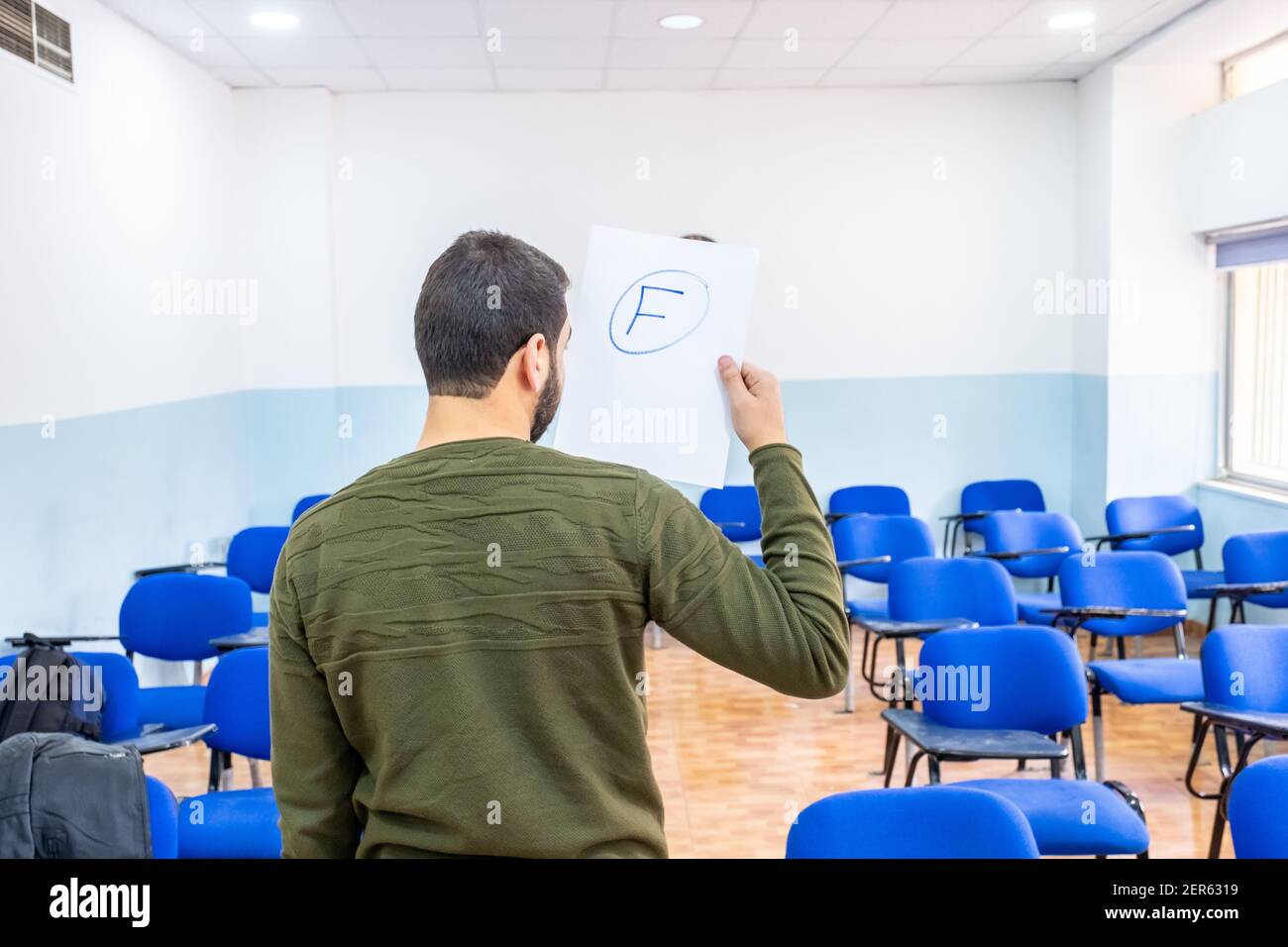 Arabic student getting his exam results Stock Photo - Alamy