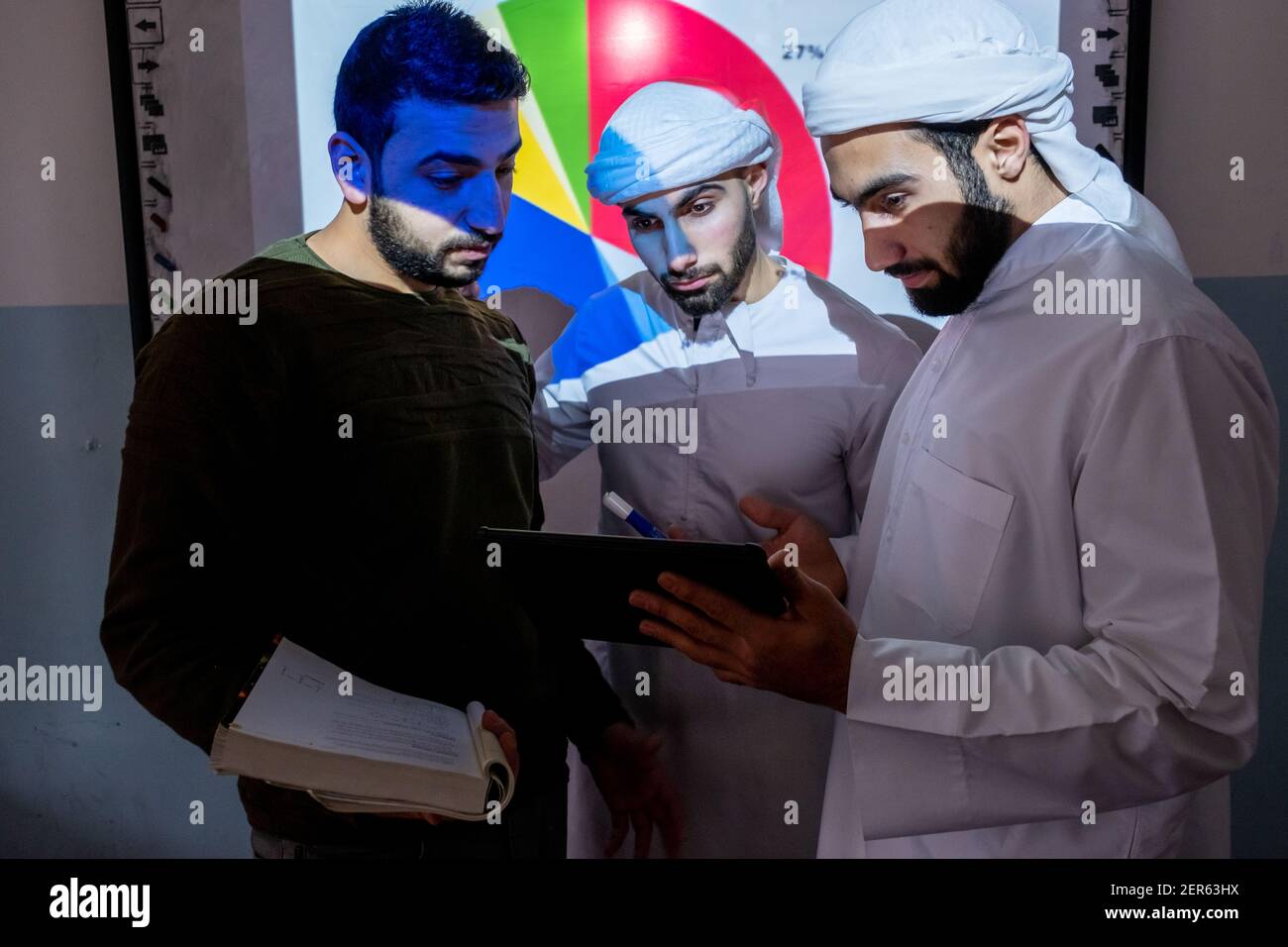 Group of arabic friends preparing presentation togther Stock Photo - Alamy
