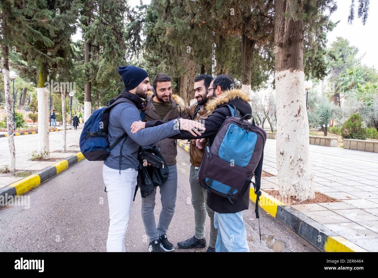 Happy arabic muslim friends enjoying life at university Stock Photo - Alamy
