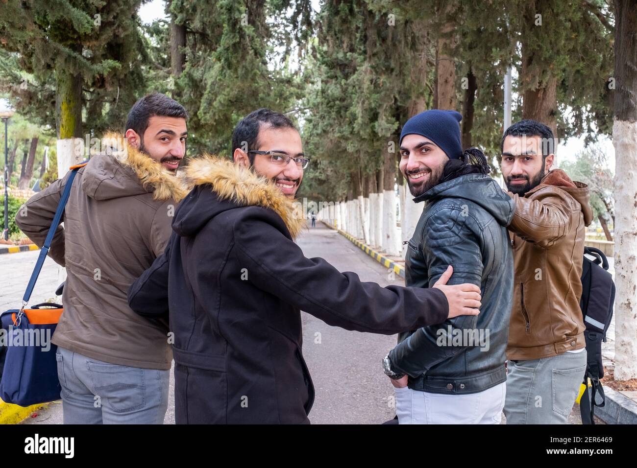 Happy arabic muslim friends enjoying life at university Stock Photo - Alamy