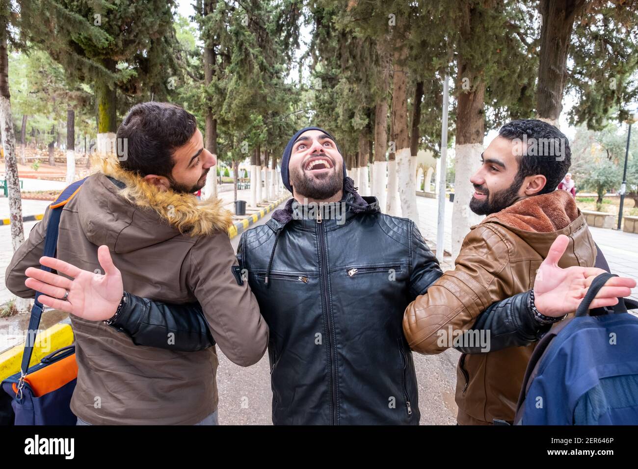 Happy arabic muslim friends enjoying life at university Stock Photo - Alamy