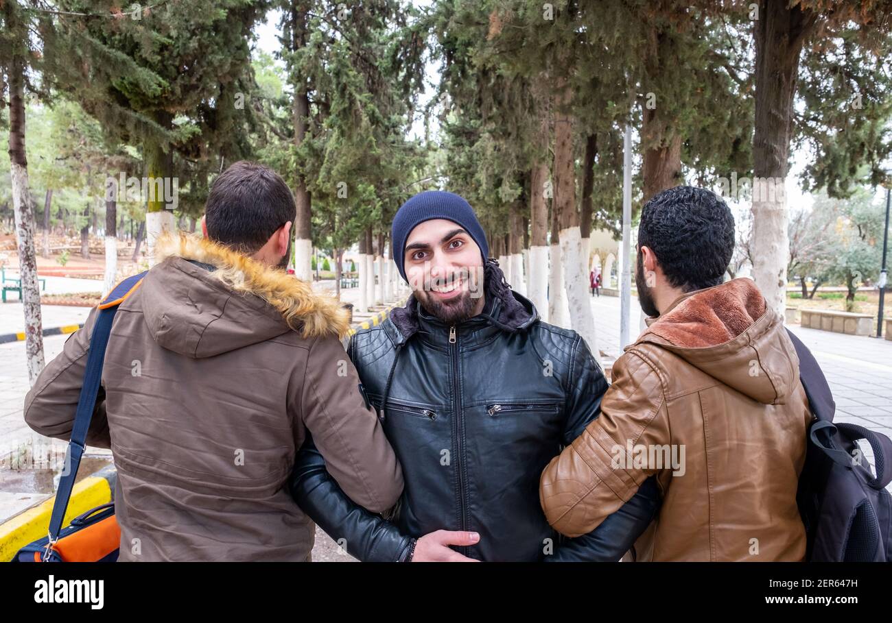 Happy arabic muslim friends enjoying life at university Stock Photo - Alamy
