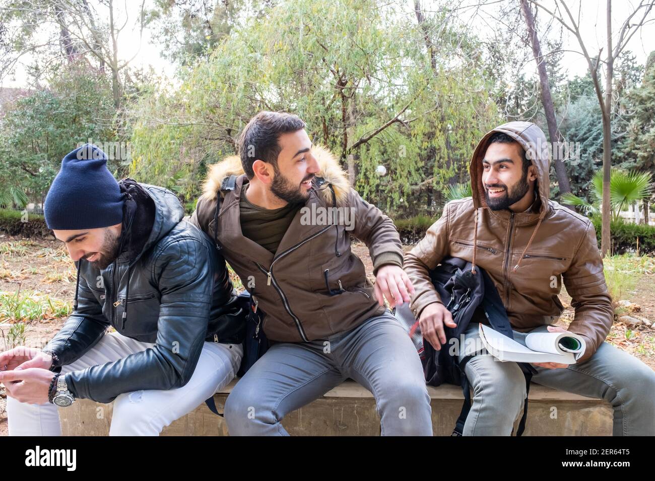 Arabic muslim friends at university studying togther Stock Photo - Alamy