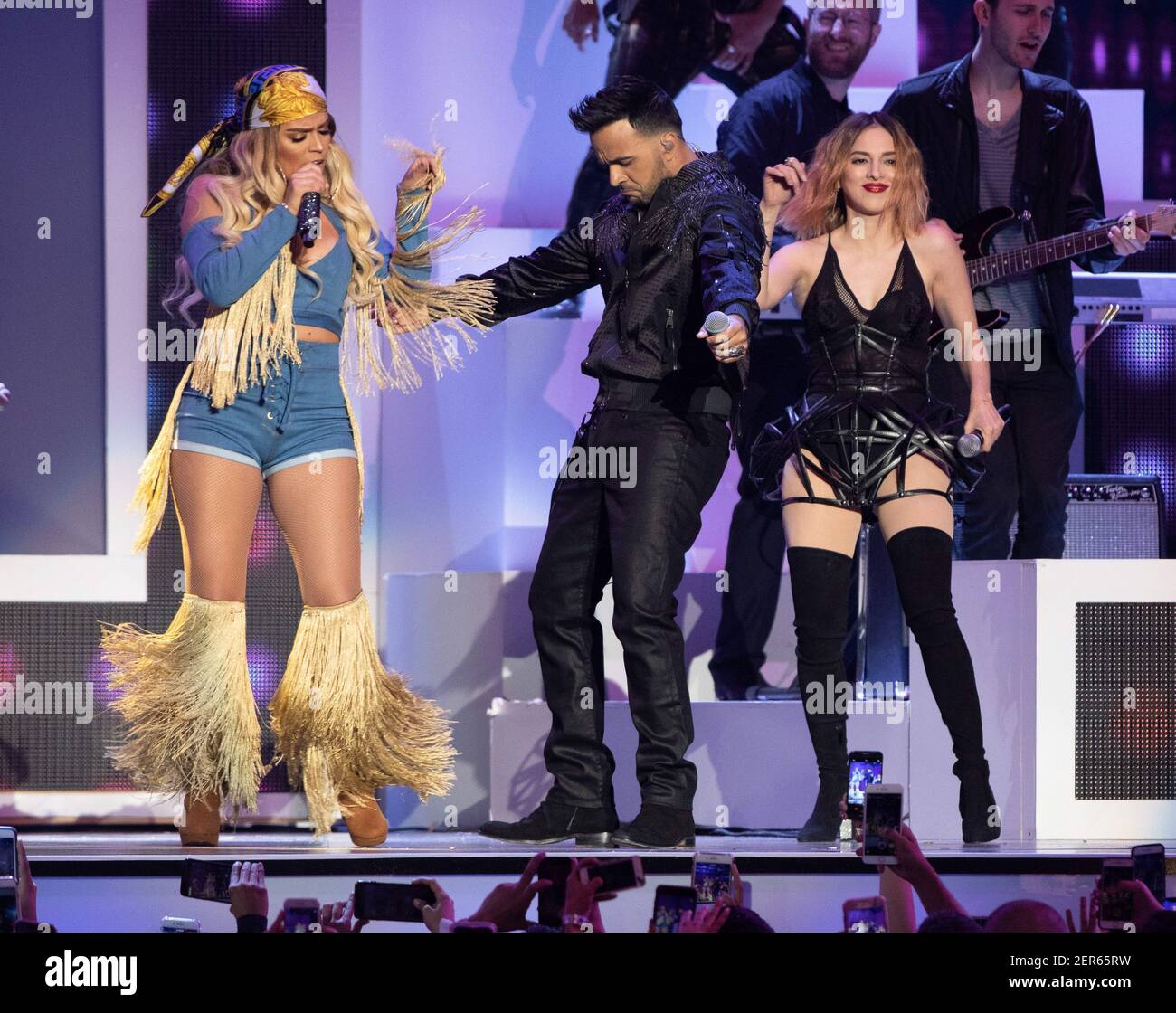Karol G, Luis Fonsi and Paty Cantu performing during the Billboard ...