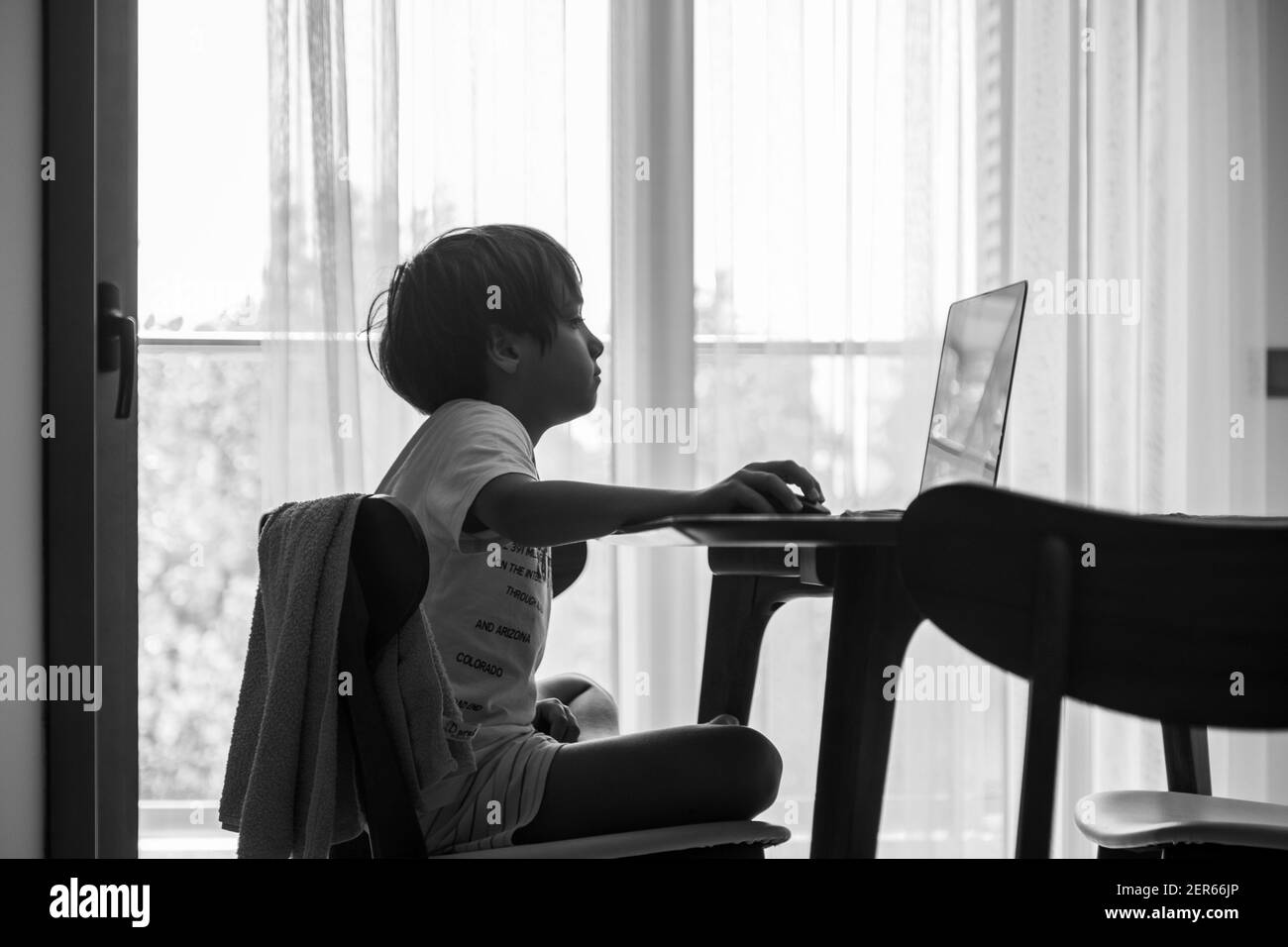 Kid on laptop Black and White Stock Photos & Images - Alamy