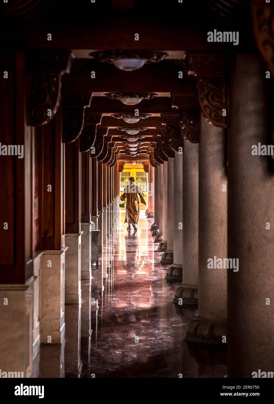 A monk is walking in an ancient temple in Shanghai, China Stock Photo ...