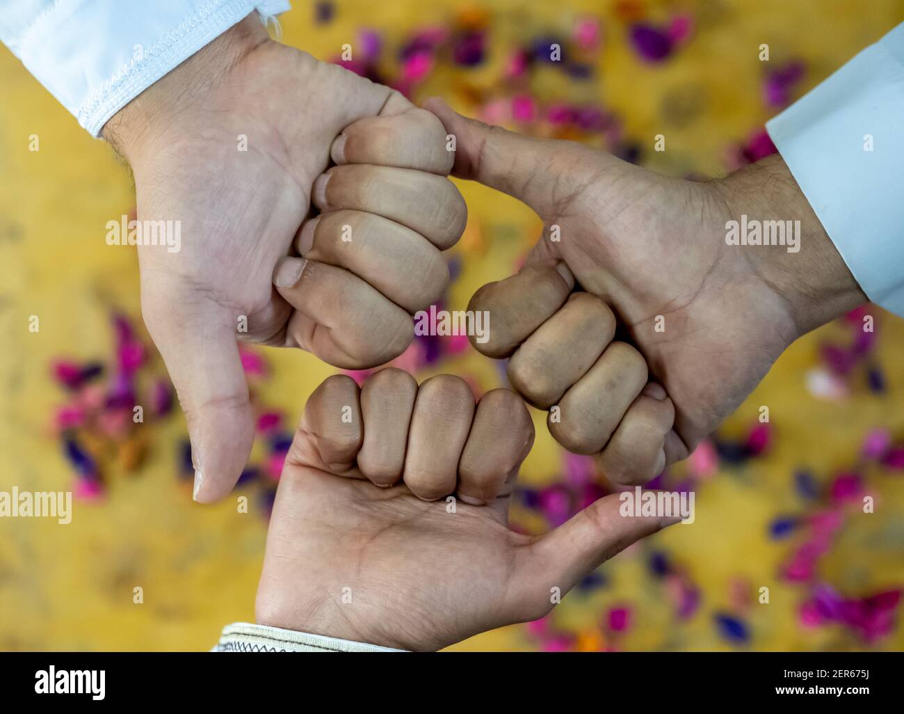 Arabic muslim people hands together forming a symbol Stock Photo - Alamy