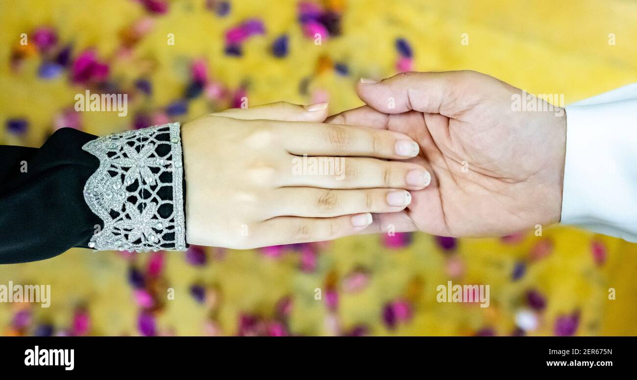 Arabic muslim people hands together forming a symbol Stock Photo - Alamy